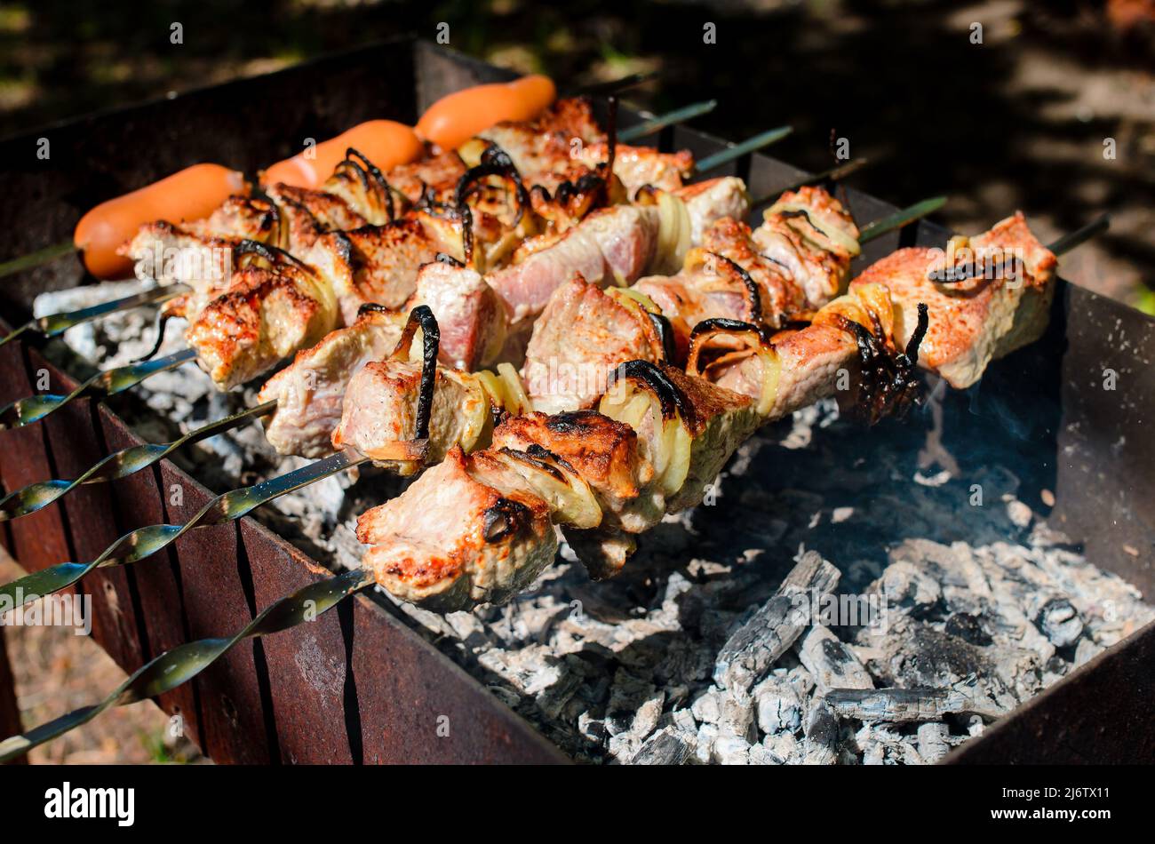 Pork Meat Chop Cooked On The Barbecue Grill Stock Photo - Alamy