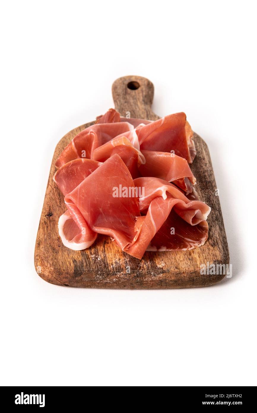 Spanish serrano ham isolated on white background Stock Photo - Alamy