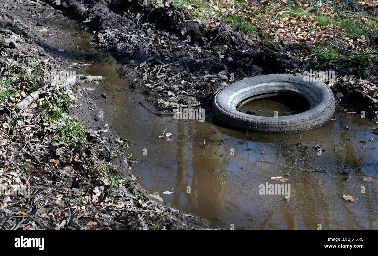Discarded car tyre pollution hi-res stock photography and images - Alamy