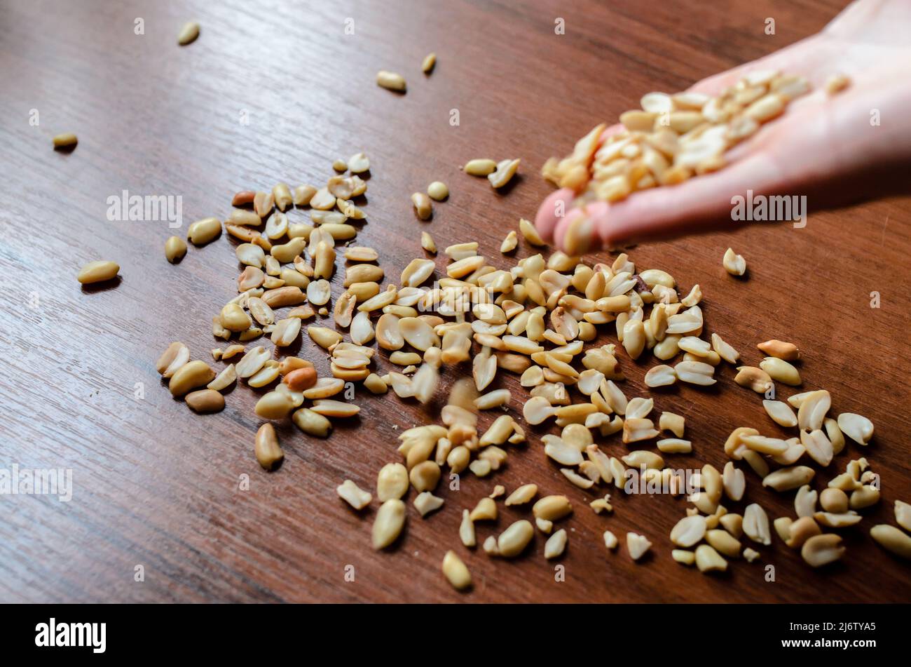 Peanuts spilled on table hi-res stock photography and images - Alamy