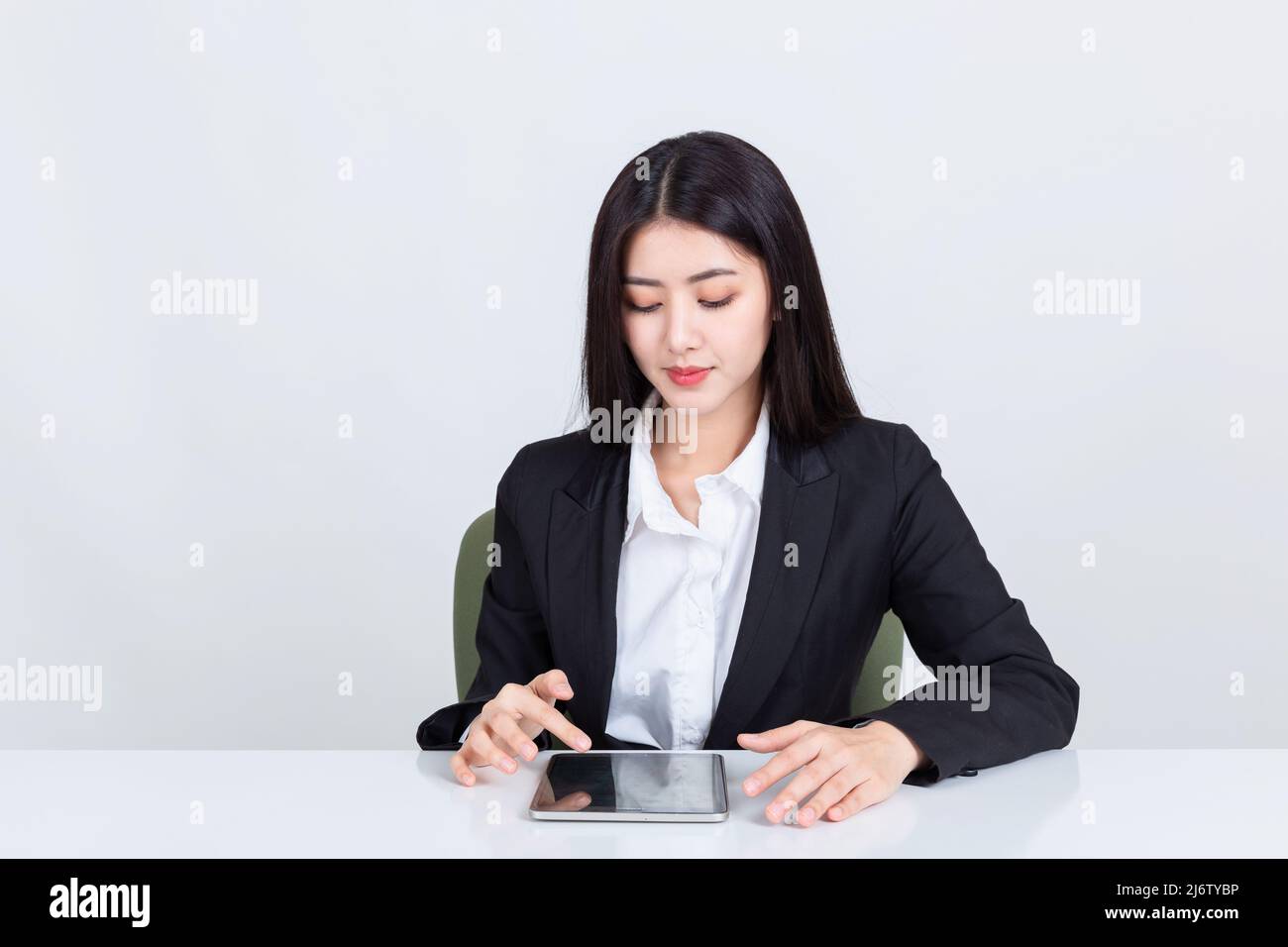 Asian woman leaning desk hi-res stock photography and images - Alamy