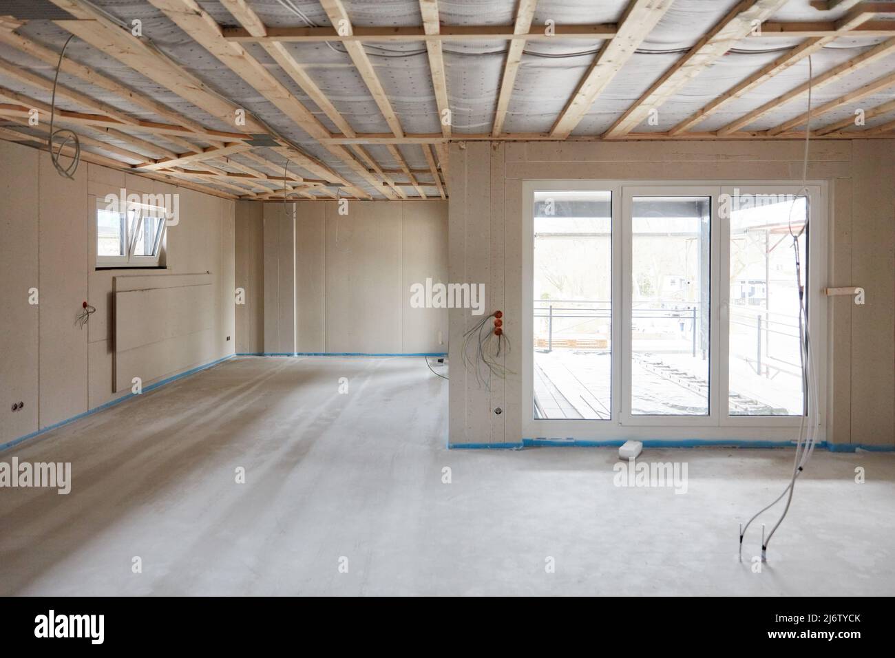 Laying screed by screed layers during the interior design of a house in ...