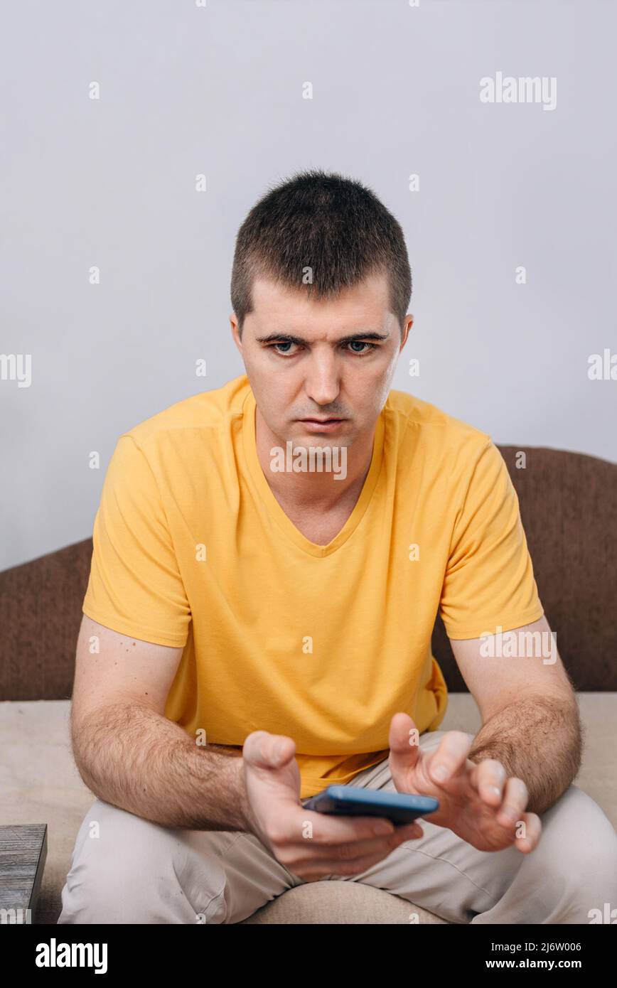 Mobile phone sad pain hi-res stock photography and images - Alamy