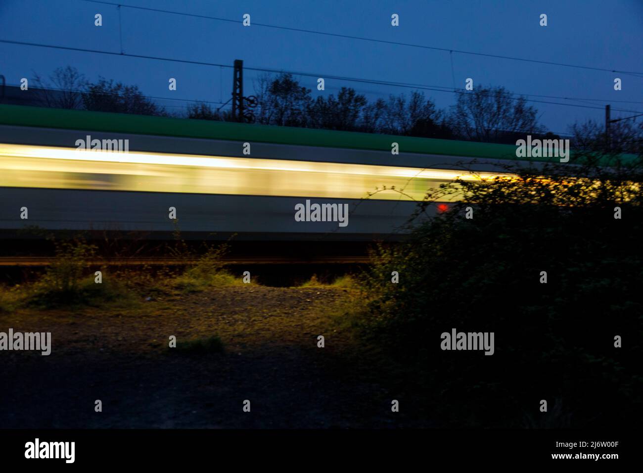 Driving night train on tour Stock Photo - Alamy