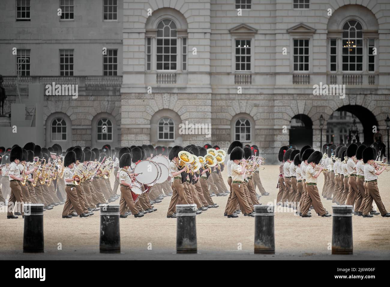 The queen's guards band in their bearskin hats practise trooping the ...
