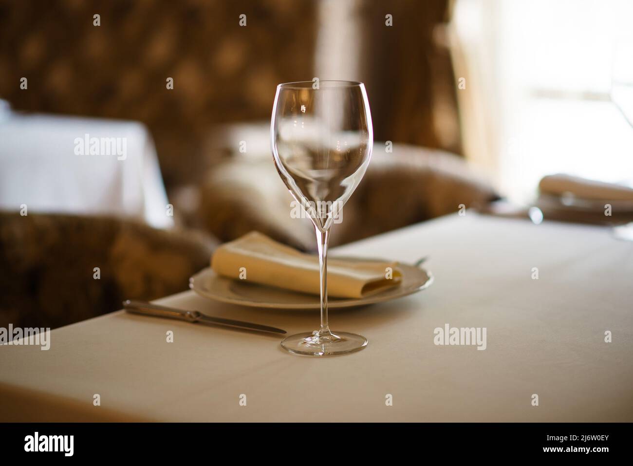 Beautiful table setting, with glasses and utensils Stock Photo - Alamy
