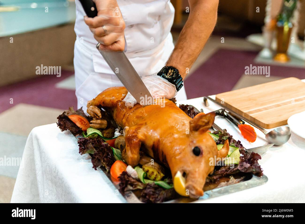 Baked pork shank with sauerkraut and beer on a wooden table. German ...
