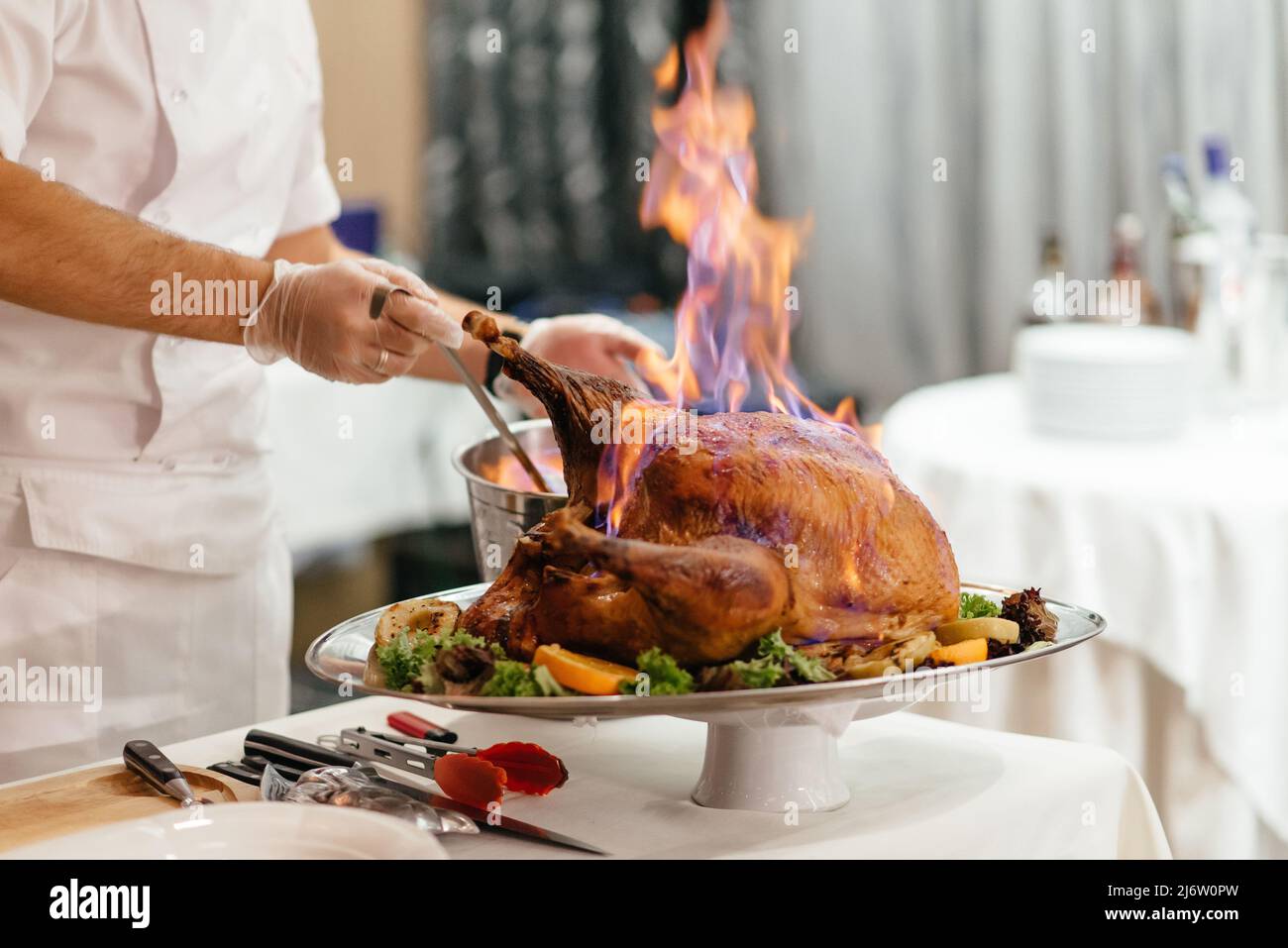 Baked Turkey on a platter in the fire with vegetables Stock Photo - Alamy
