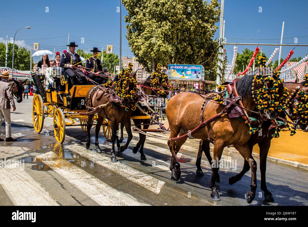 Seville, Spain - May 01, 2022 Sevillians dressed in the traditional ...