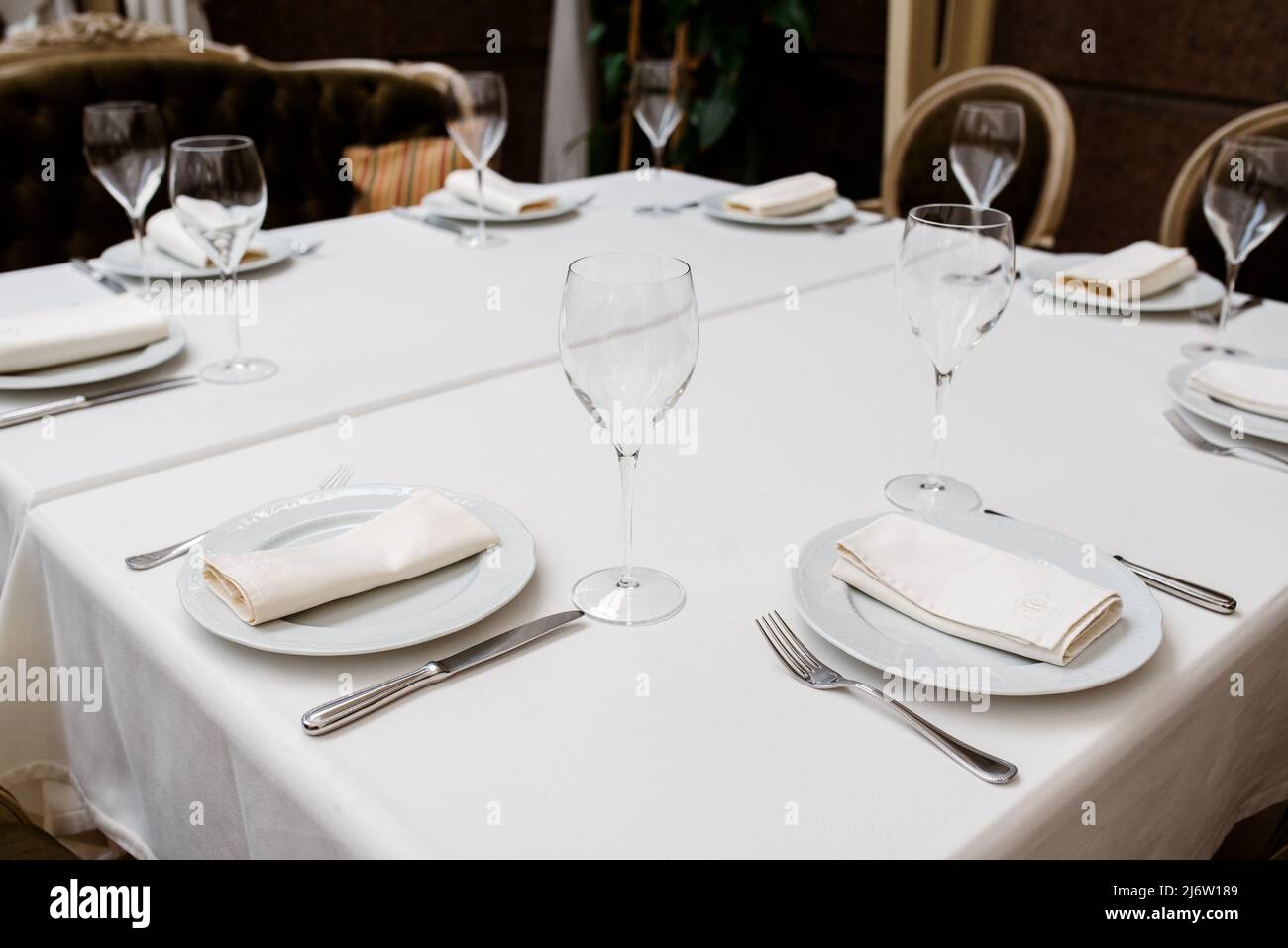 Beautiful table setting, with glasses and utensils Stock Photo - Alamy