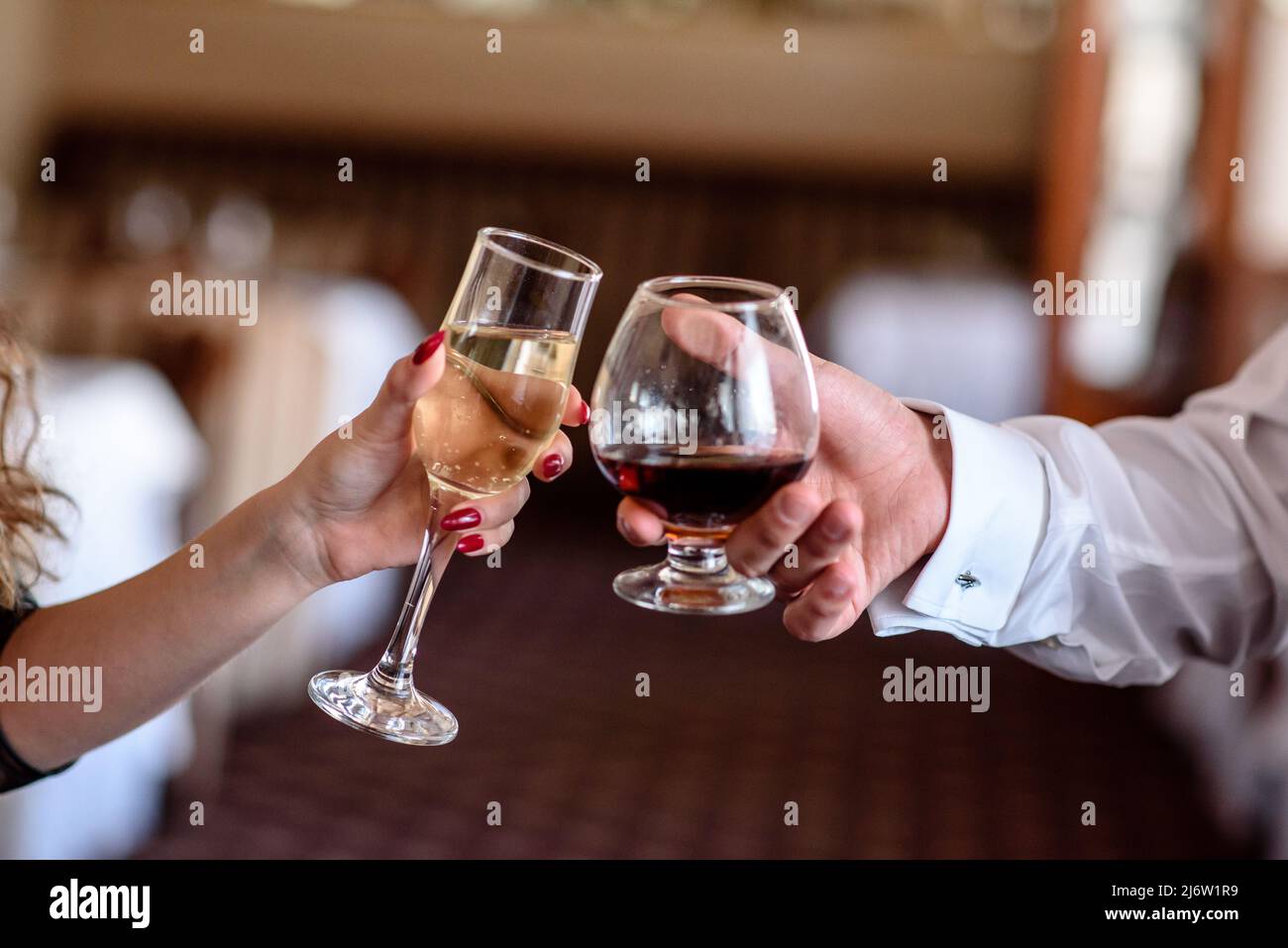 hand making toast with glass Stock Photo - Alamy