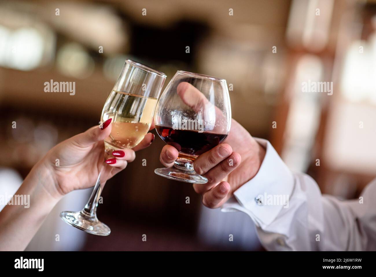 hand making toast with glass Stock Photo - Alamy