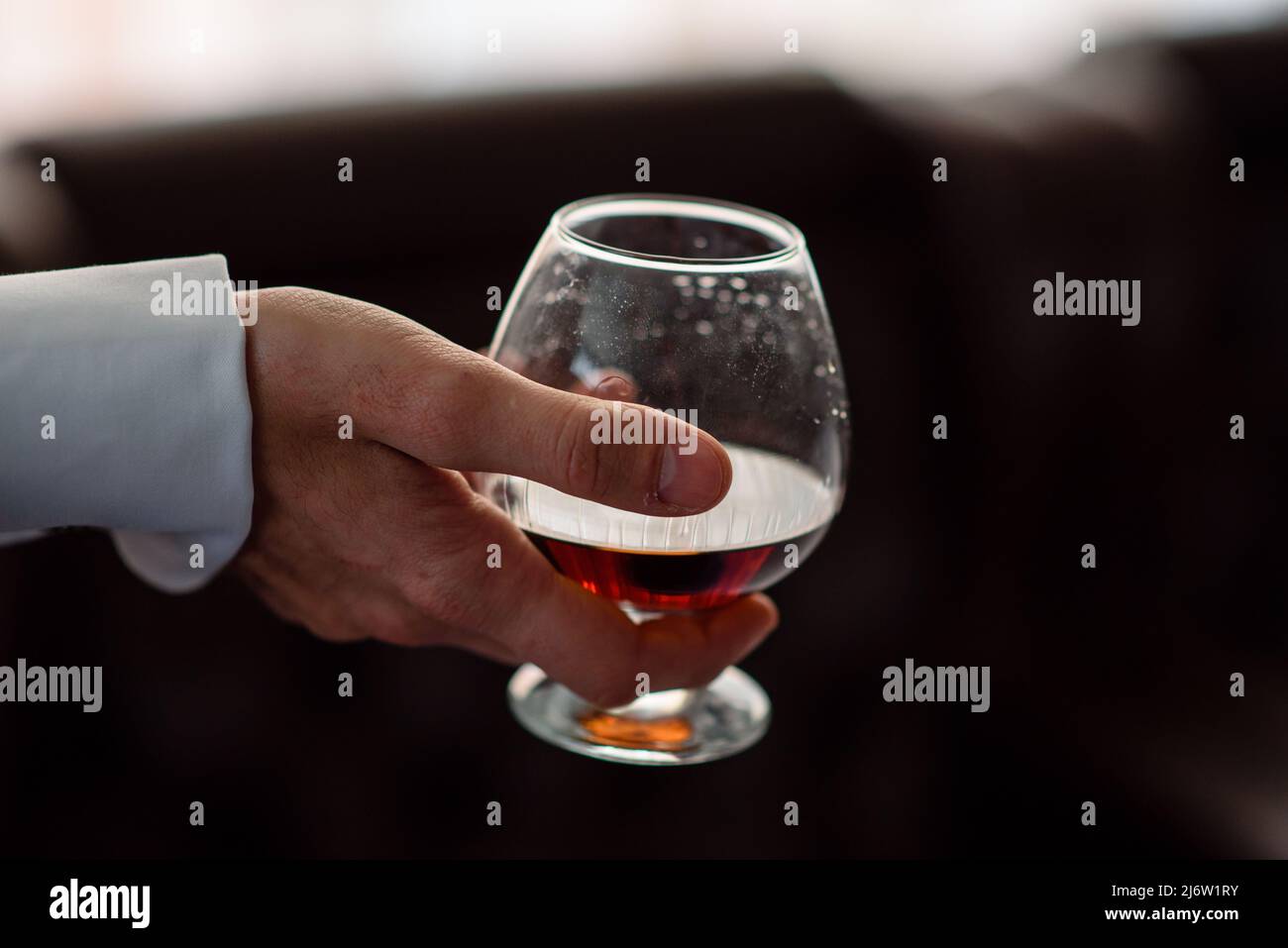 Drinking cognac with friends hi-res stock photography and images - Alamy