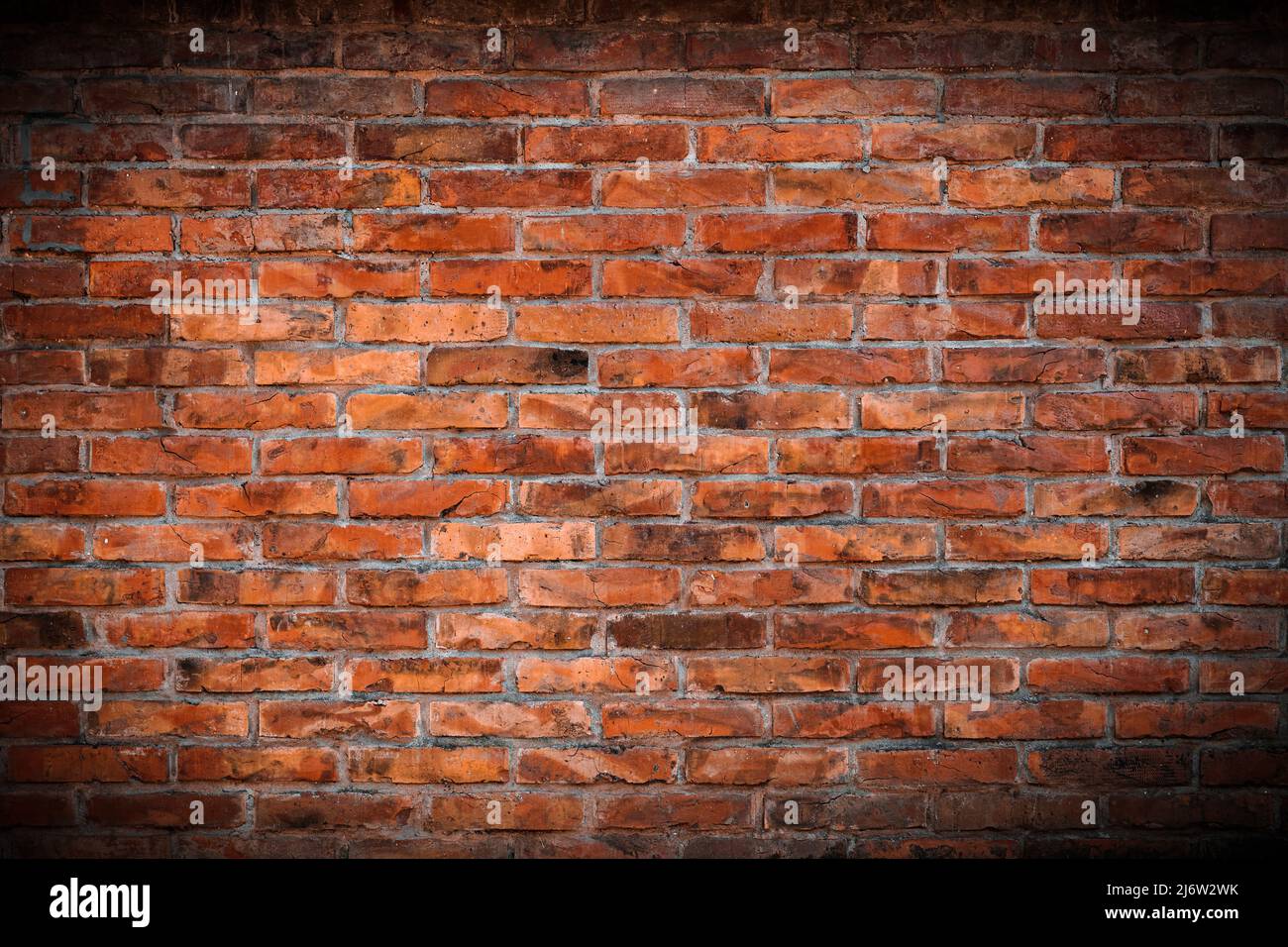 Background of an old red clay brick wall surface, old worn grunge ...