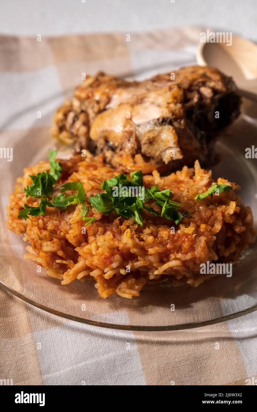 Nigerian food: Jollof rice with fried chicken close-up on a plate ...