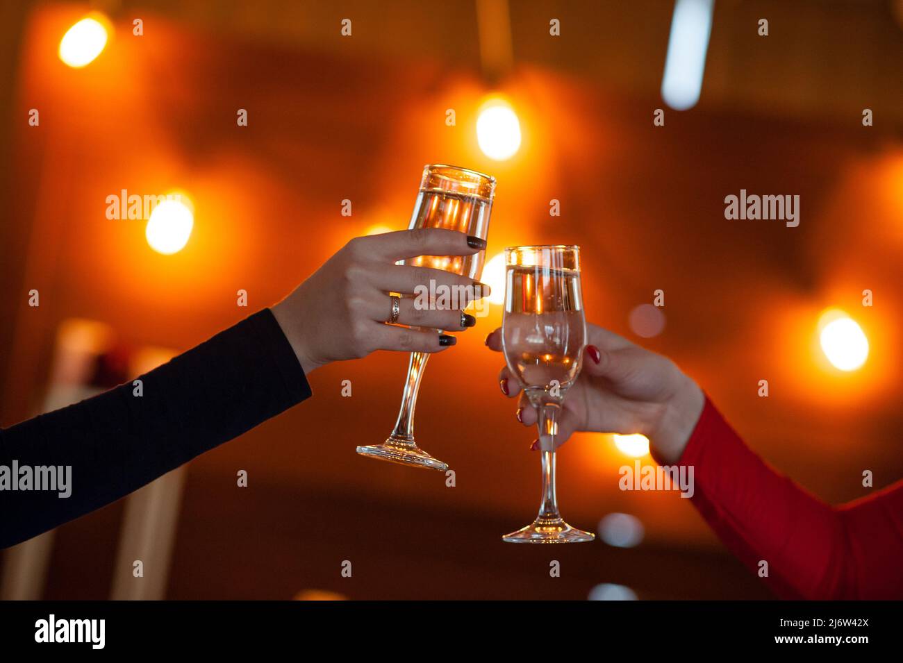 Celebration. People holding glasses of champagne making a toast Stock ...