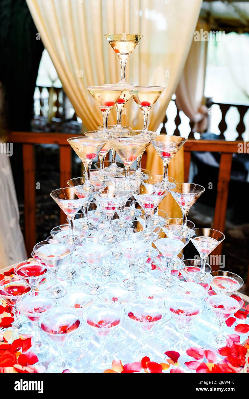 Champagne glass pyramid. pyramid of glasses of wine, champagne, tower ...