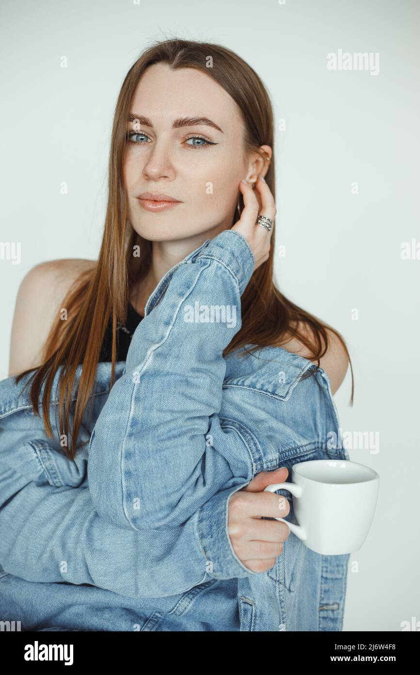 Portrait of young smiling wonderful woman with long dark hair, make-up ...