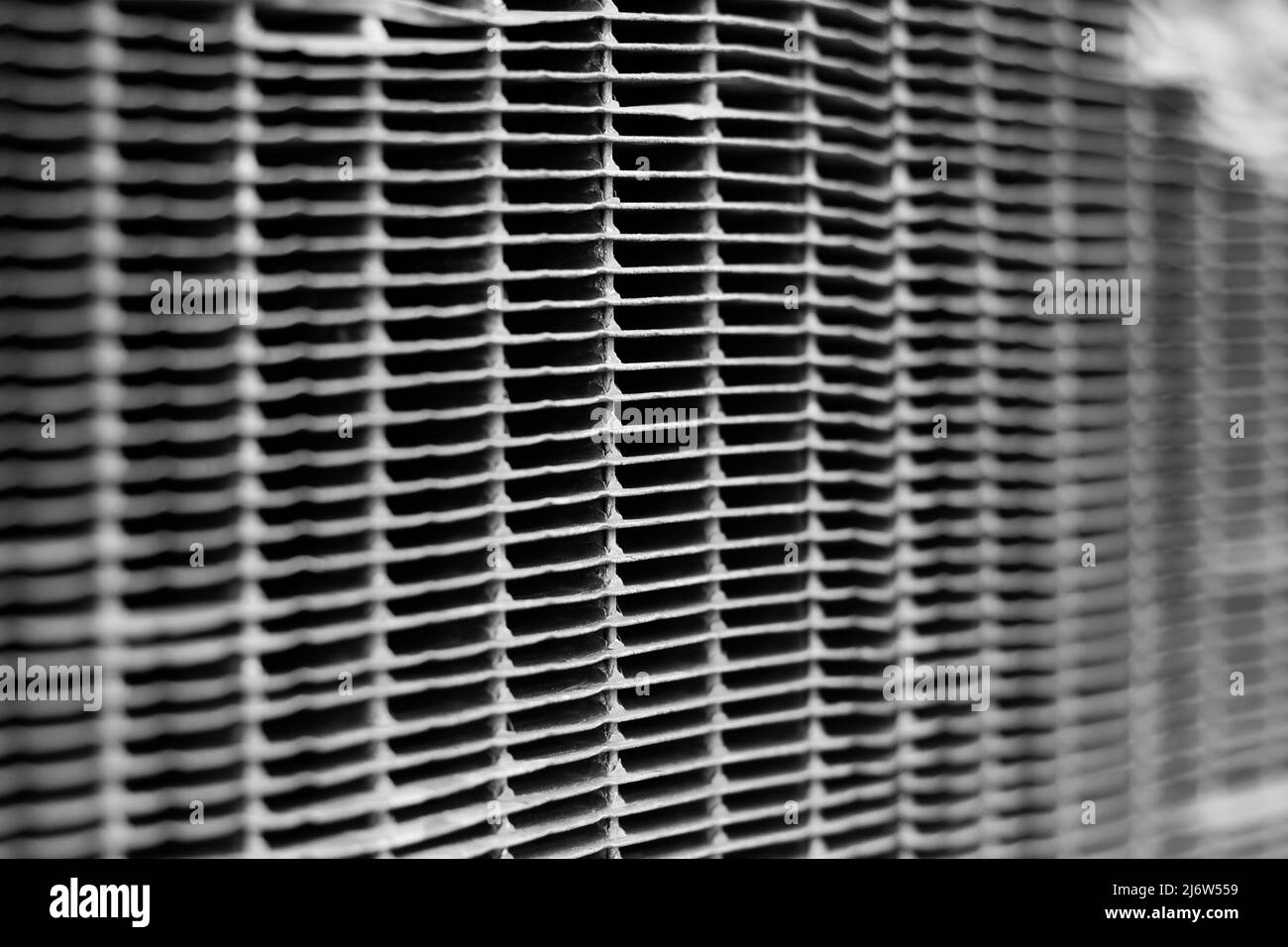 Vintage rusty farm tractor front motor grille in black and white Stock ...