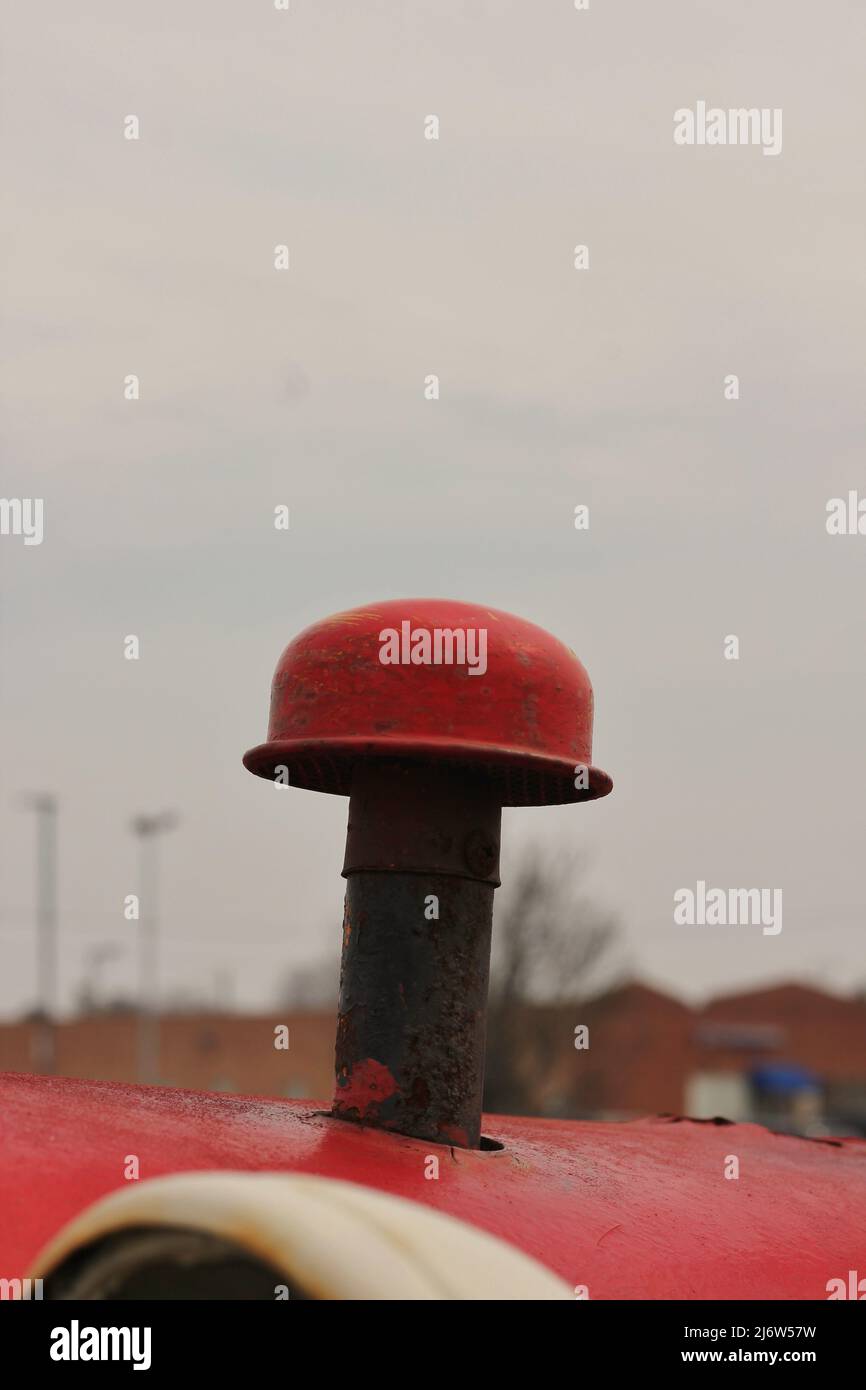 Vintage rusty farm tractor engine vent stack Stock Photo - Alamy