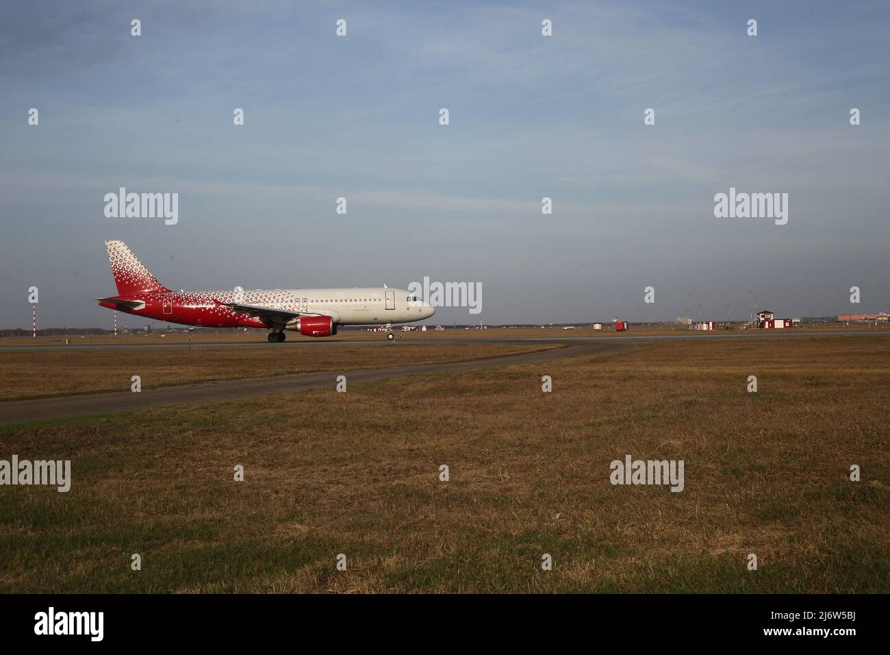 transportation concept - passenger aircraft on bearing track in the ...