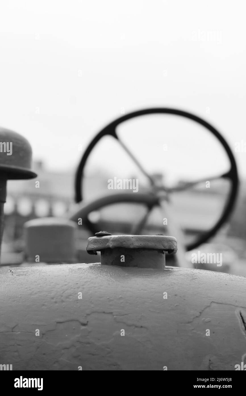 Vintage rusty farm tractor gas tank cap in black and white Stock Photo ...