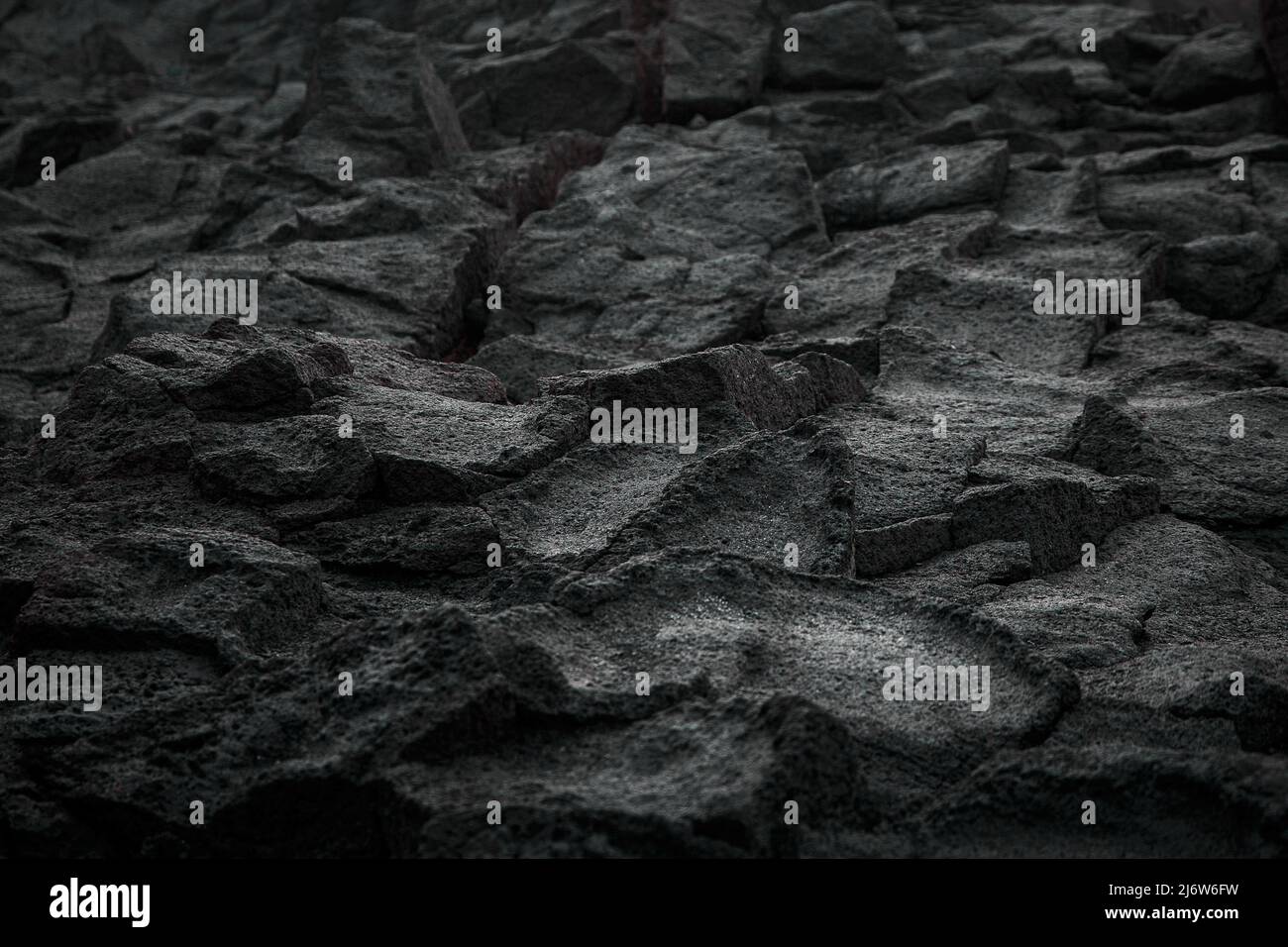 Volcanic rock black texture close up Stock Photo - Alamy
