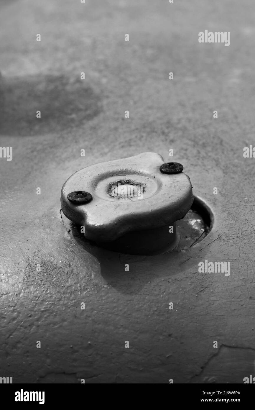 Vintage rusty farm tractor gas tank cap in black and white Stock Photo ...