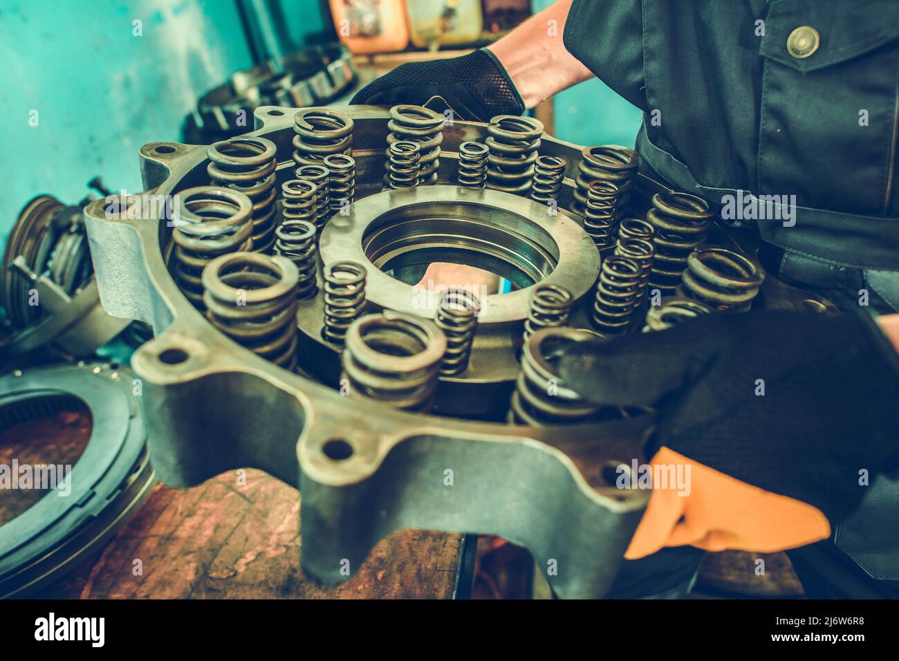 Heavy Duty Equipment Replacement Parts in Professional Mechanic Hands ...