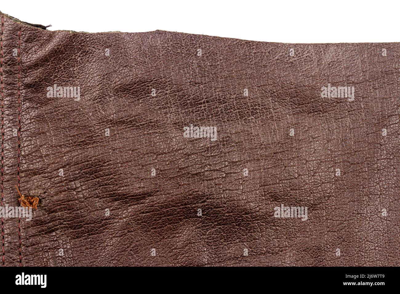 Piece of brown leather isolated on white background. Crumpled material ...