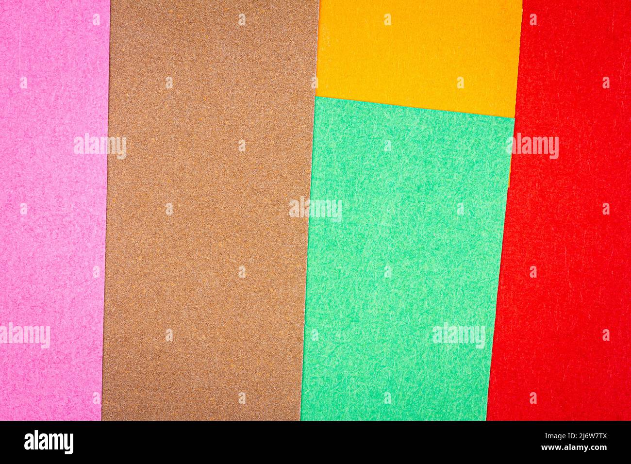Multicolor background from a paper of different colors. Abstract ...