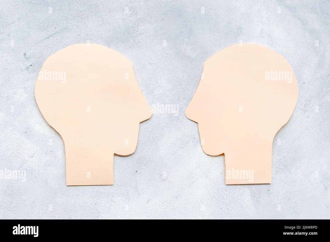 Two shape of men head - connection and communication concept Stock ...
