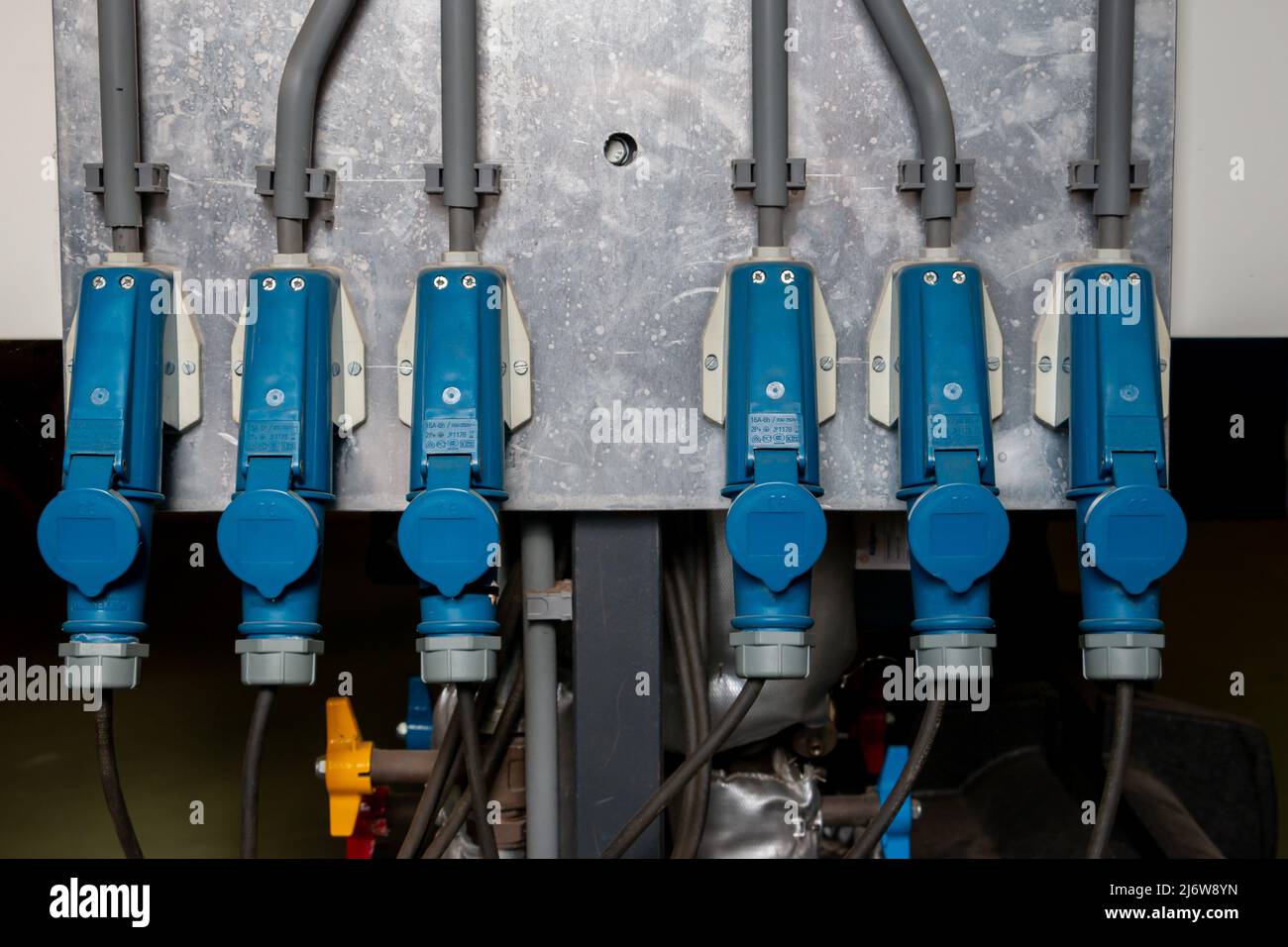 Blue plugs for three-phase power in an industrial environment for ...