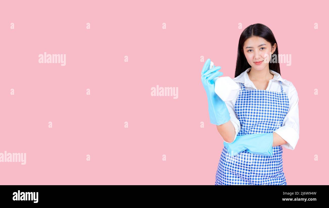 Portrait asian beautiful woman wearing apron and rubber gloves for ...
