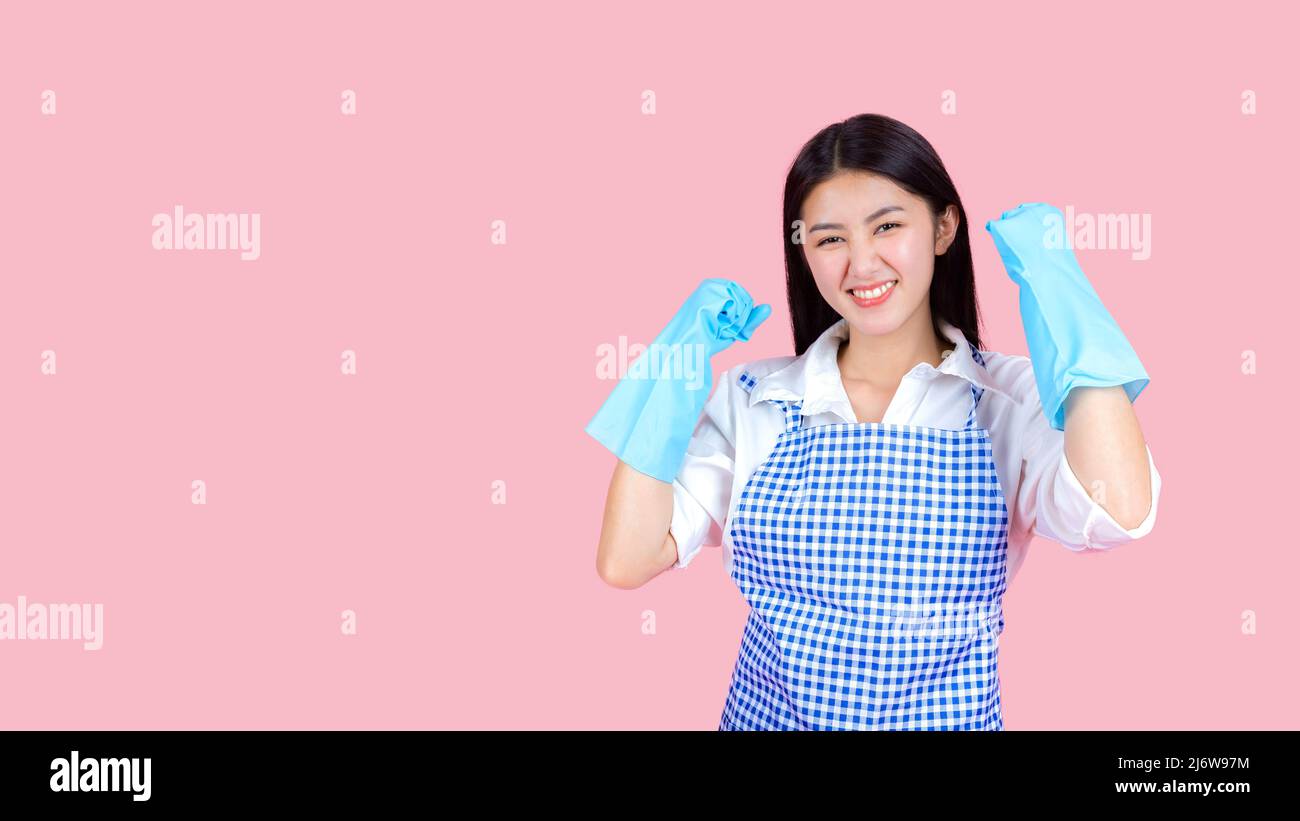 Portrait asian beautiful woman wearing apron and rubber gloves for ...