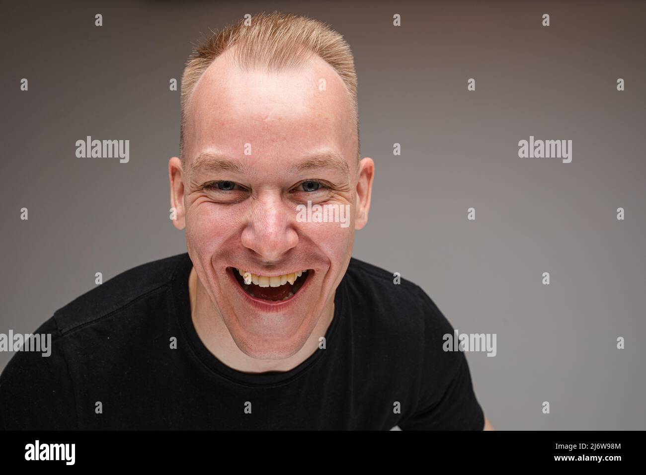 Blond male headshot hi-res stock photography and images - Alamy