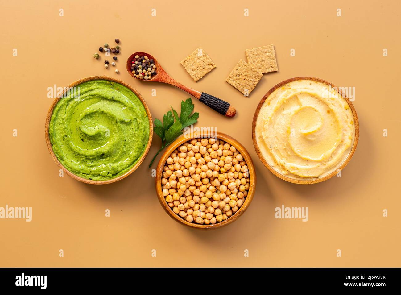 Hummus with snacks set - various types of hummus in bowls Stock Photo ...