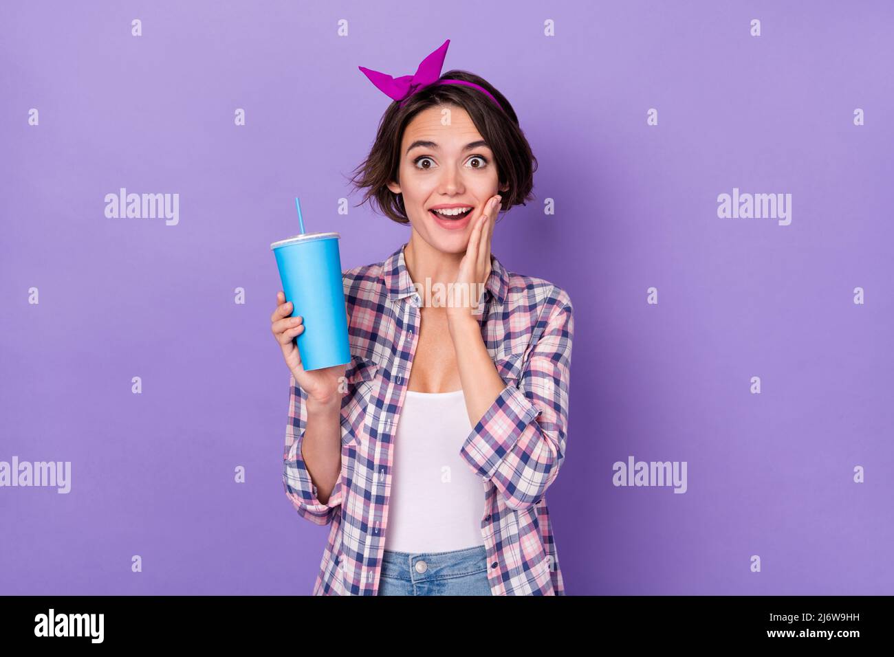 Photo of young excited girl hand touch cheek enjoy fizzy drink diet ...