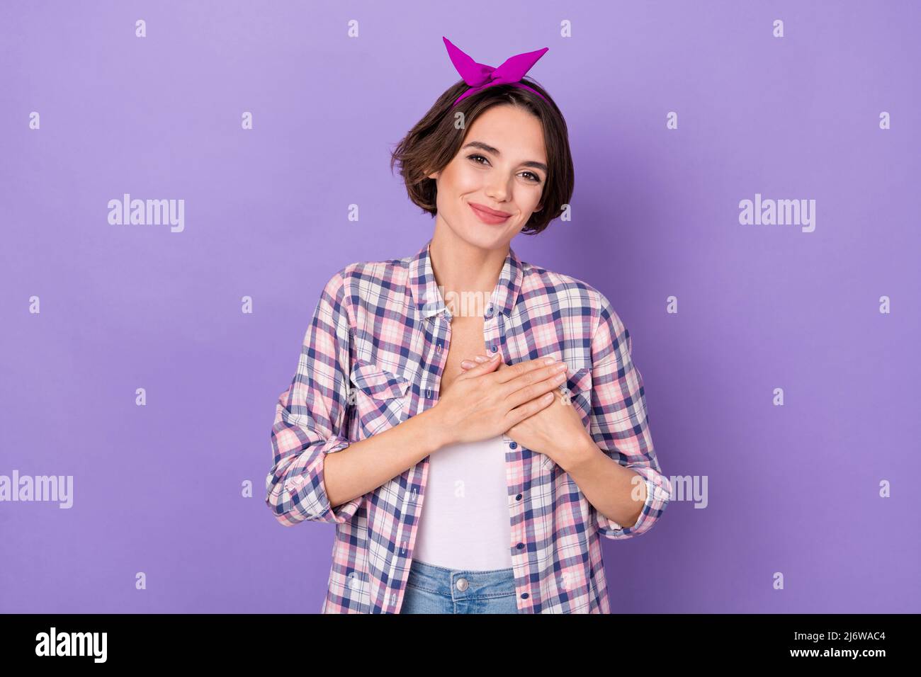 Portrait of charming positive joyful lady touch hands heart express ...