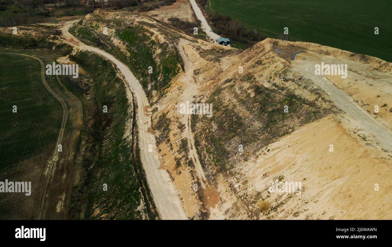 Conserved landfill for household waste. A mound of rubbish. Aerial ...
