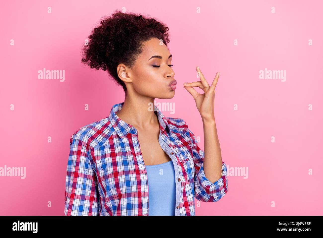 Portrait of attractive dreamy funky wavy-haired girl tasting new ...