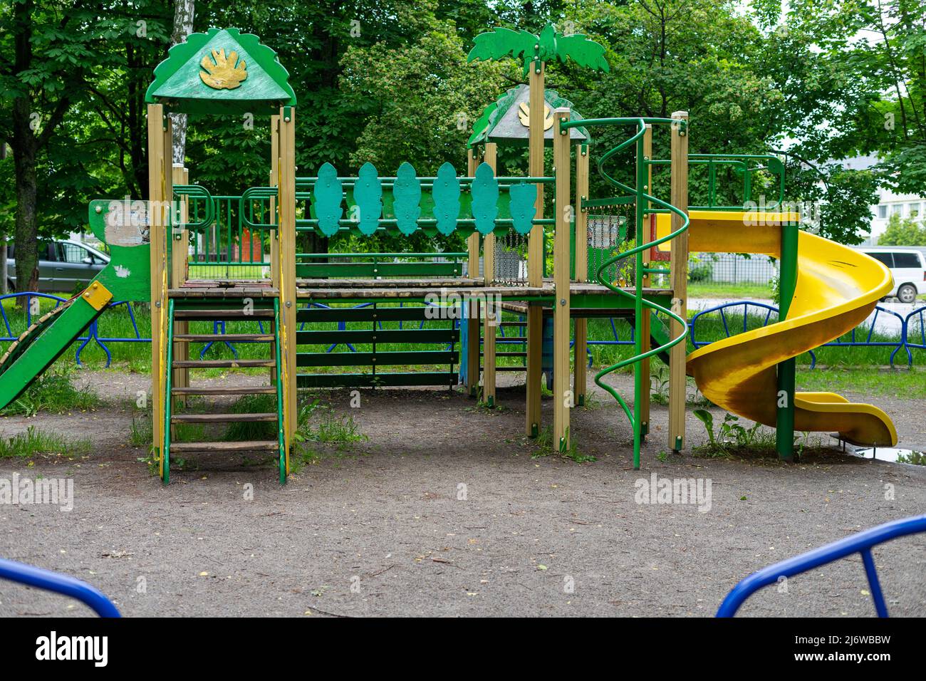 Children's colored slides playground on a street Stock Photo - Alamy