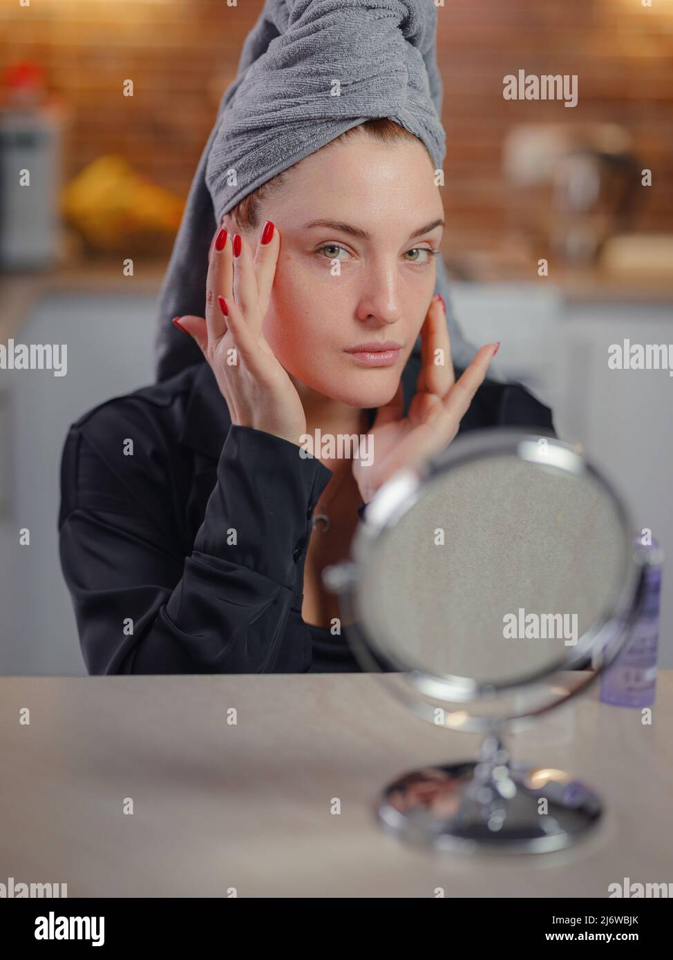 Happy beautiful young woman satisfied with professional cosmetic ...