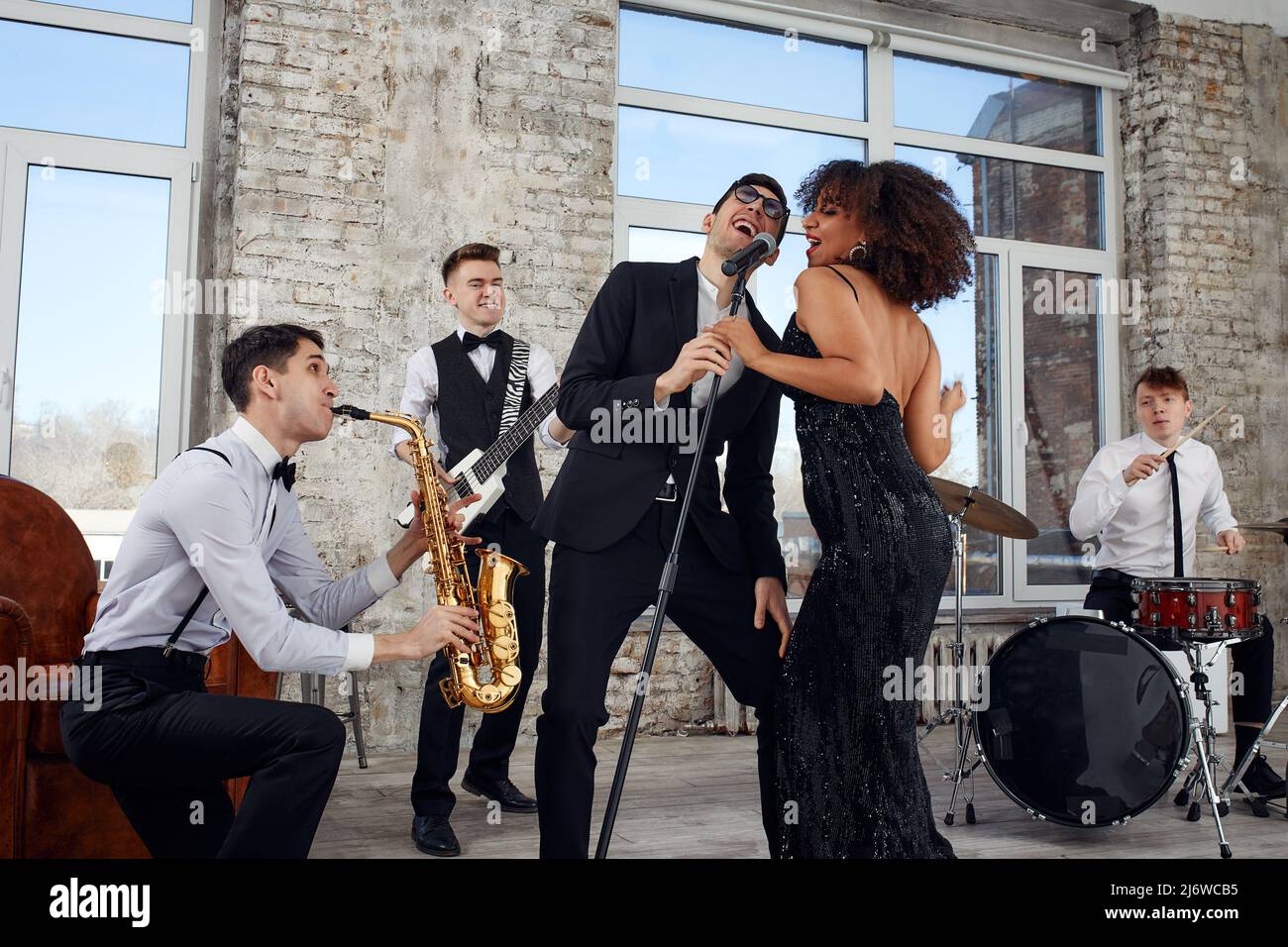 Young international musicians, a band performing on the loft stage. The ...