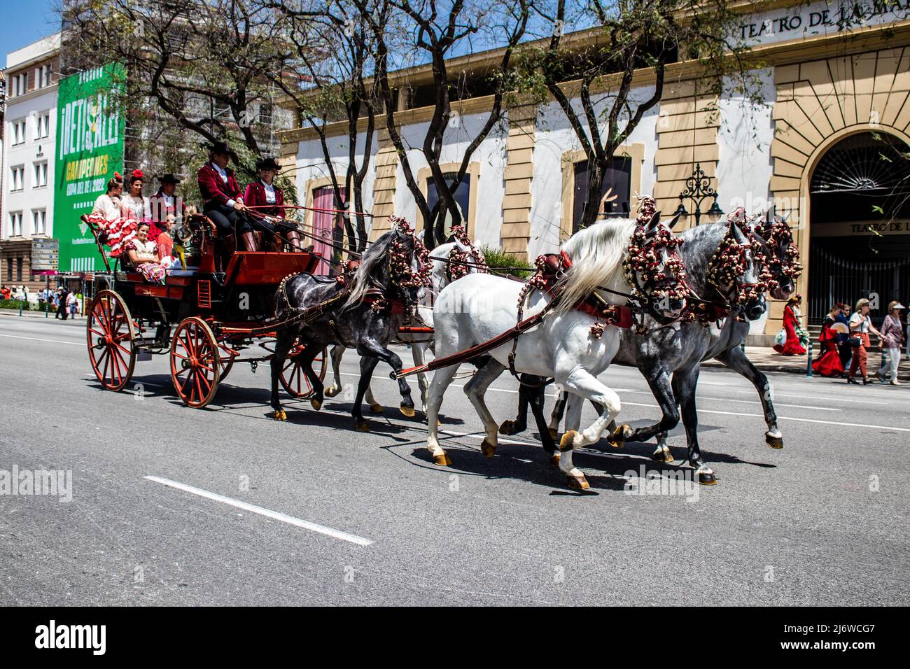 Seville, Spain- May 01, 2022 Sevillians dressed in traditional ...