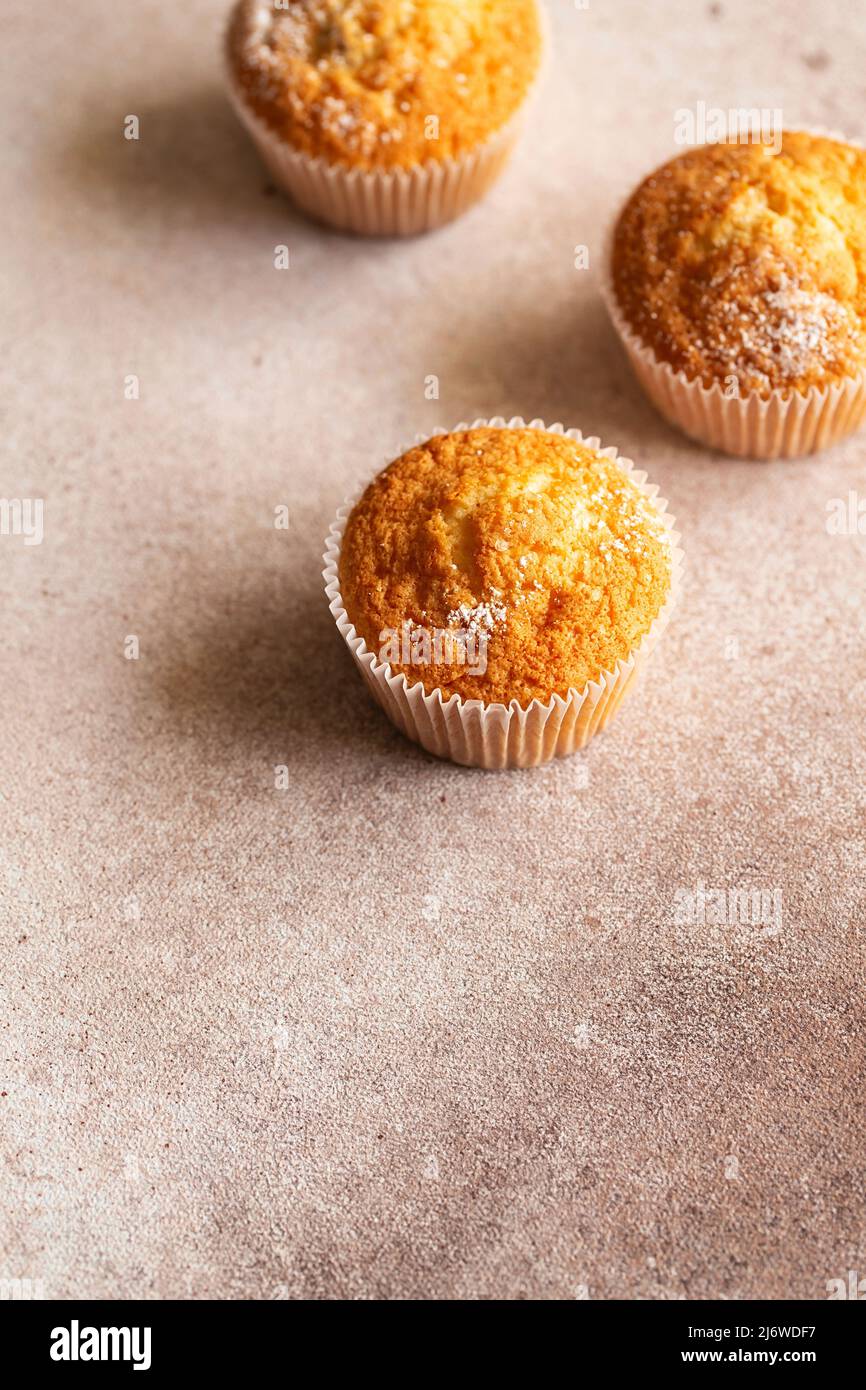 Sweet muffins with powdered sugar. Homemade bakery. Muffins in white ...