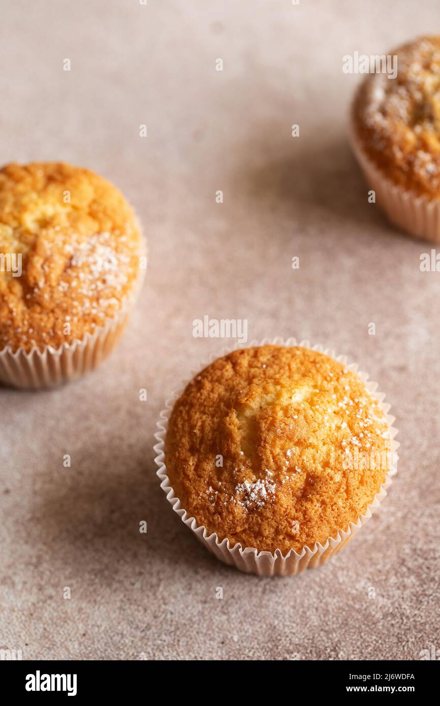 Sweet muffins with powdered sugar. Homemade bakery. Muffins in white ...