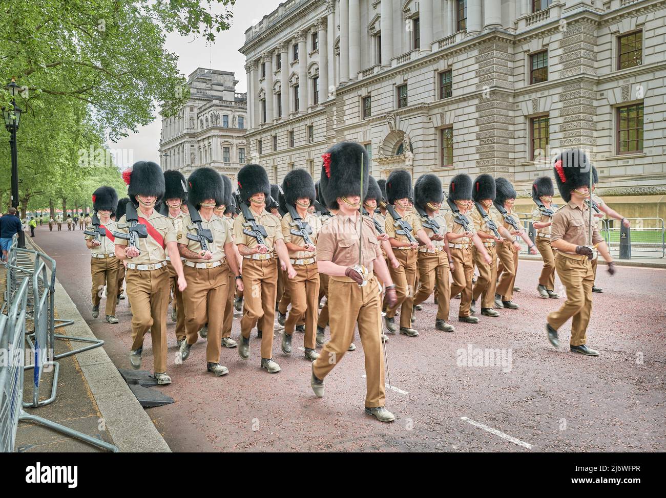 The queen's coldstream guards, in their bearskin hats and with rifles ...