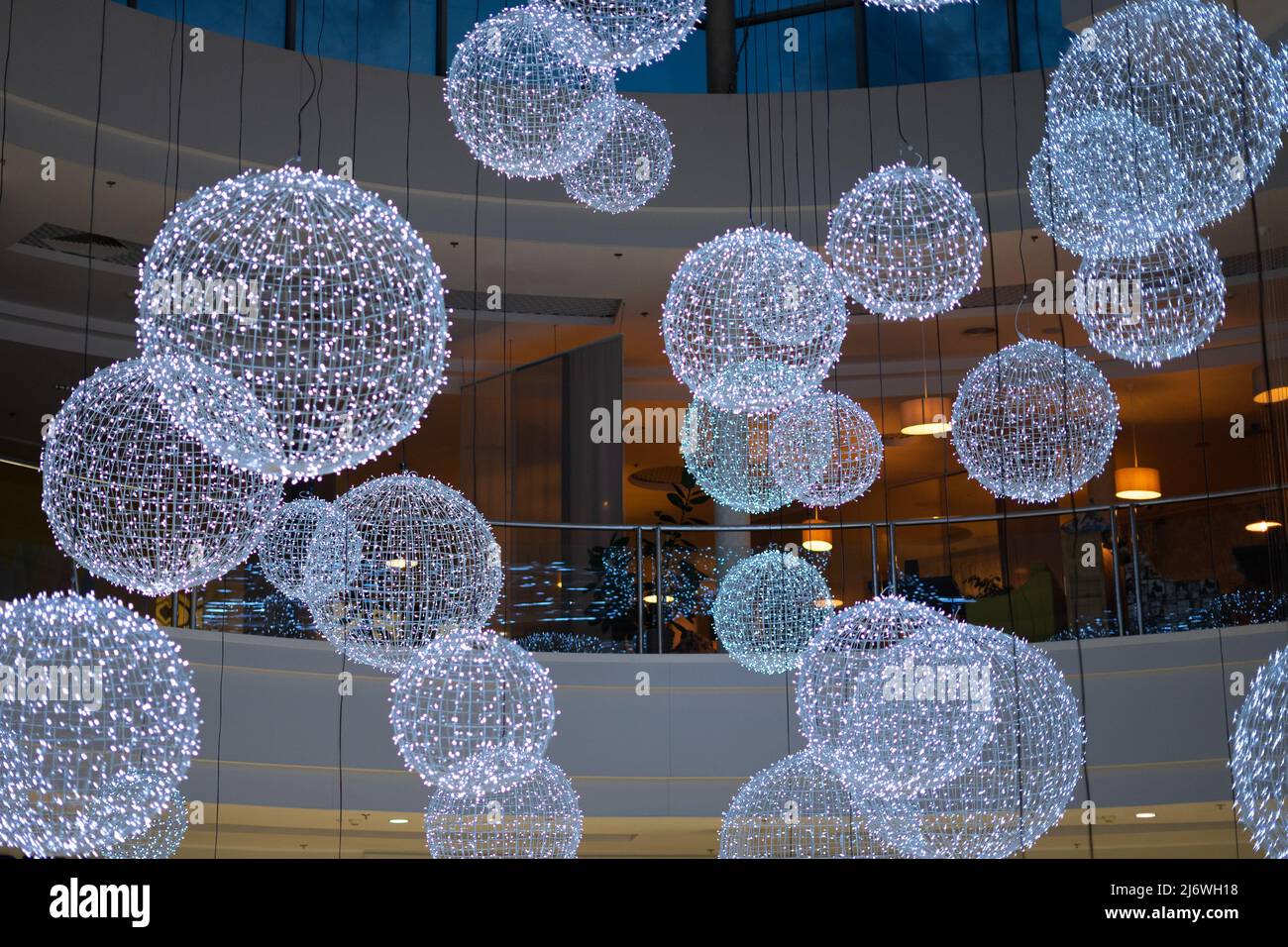 big bright balls with garlands. balls with white lights. decorations in ...