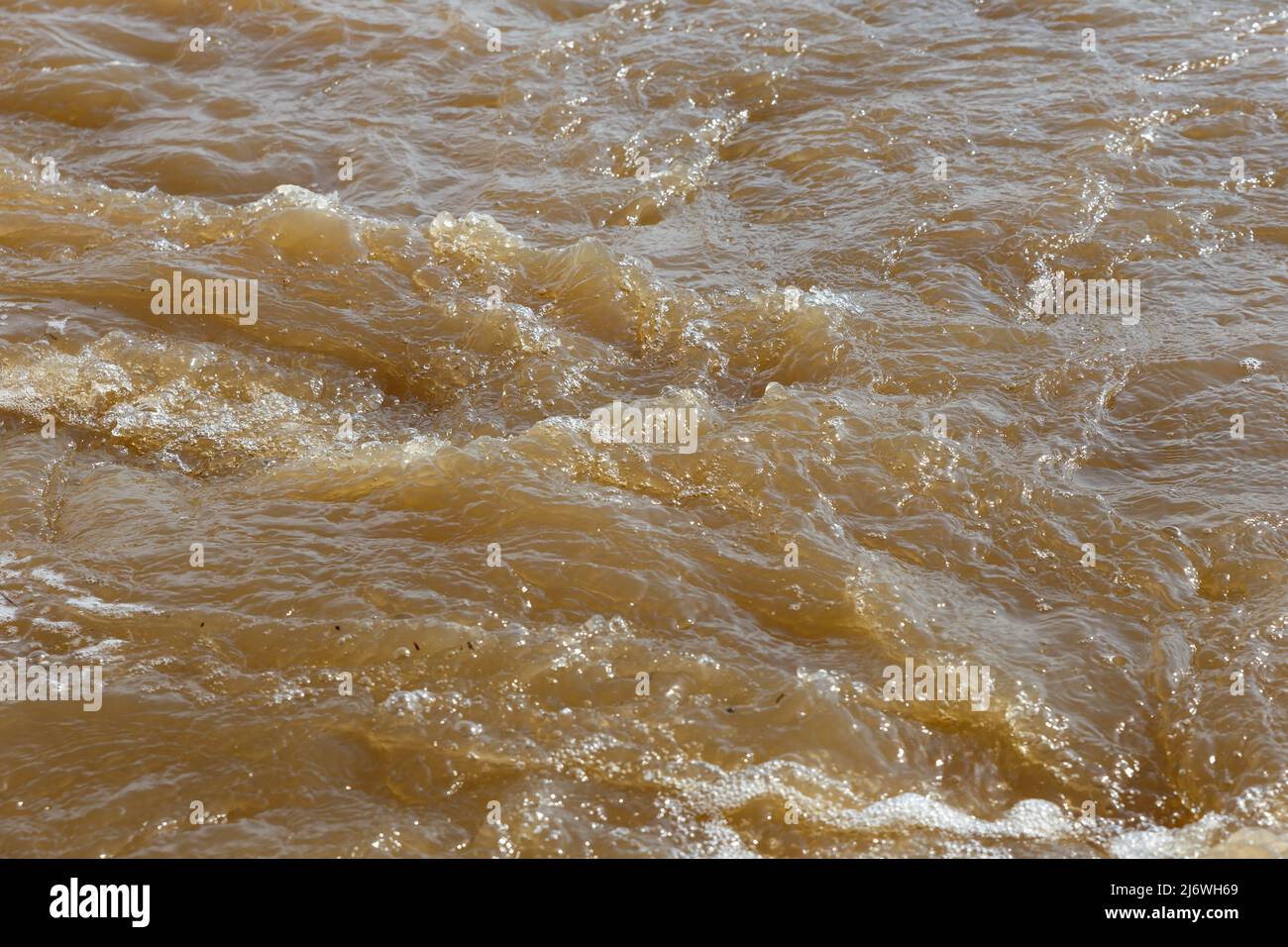 Rapid brown muddy water flow hi-res stock photography and images - Alamy